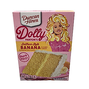 Dolly Parton Cake Mix Bundle with Buttercream Frosting - Features (2) boxes of southern banana cake mix (2) containers of buttercream frosting and (1) Make Every Day a Friday Kitchen Clip