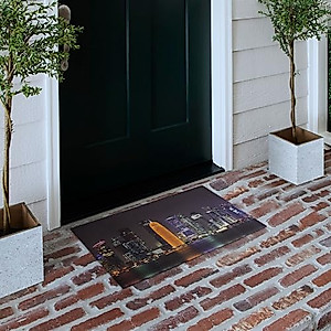 Ambesonne Urban Doormat, Qatar Middle East Town with Luminous Skyscraper at Night View, Decorative Polyester Floor Mat with Non-Skid Backing, 30" X 18", Charcoal Grey Purple Orange
