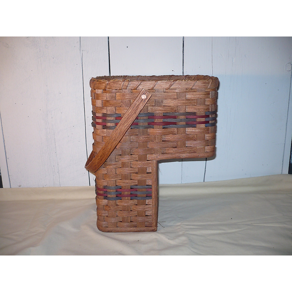 Amish Handmade Stair Step Basket (Small). This Handmade Basket Enhances Any Country Home Decor and Also Makes Carrying Items up and Down the Stairs Easier. You Will Love It! Measures: Top Opening 12" X 9" - 14.5" High - 7" From Bottom of Basket to Bottom