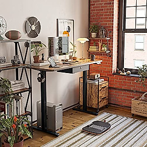 FEZIBO 55 x 24 Inches Standing Desk with Drawer, Adjustable Height Electric Stand up Desk, Sit Stand Home Office Desk, Ergonomic Workstation Black Steel Frame/Rustic Brown Tabletop