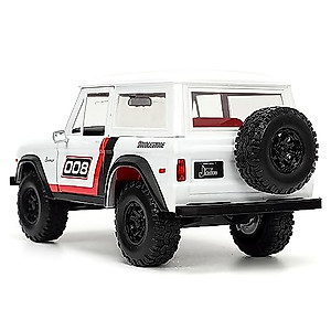 1973 Bronco #008 White with Red and Black Stripes and Red Interior with Extra Wheels Just Trucks Series 1/24 Diecast Model Car by Jada 34181