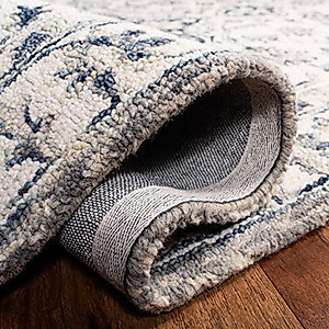 SAFAVIEH Aspen Collection Accent Rug - 4' x 6', Ivory & Blue, Handmade Boho Braided Tassel Wool, Ideal for High Traffic Areas in Entryway, Living Room, Bedroom (APN125A)