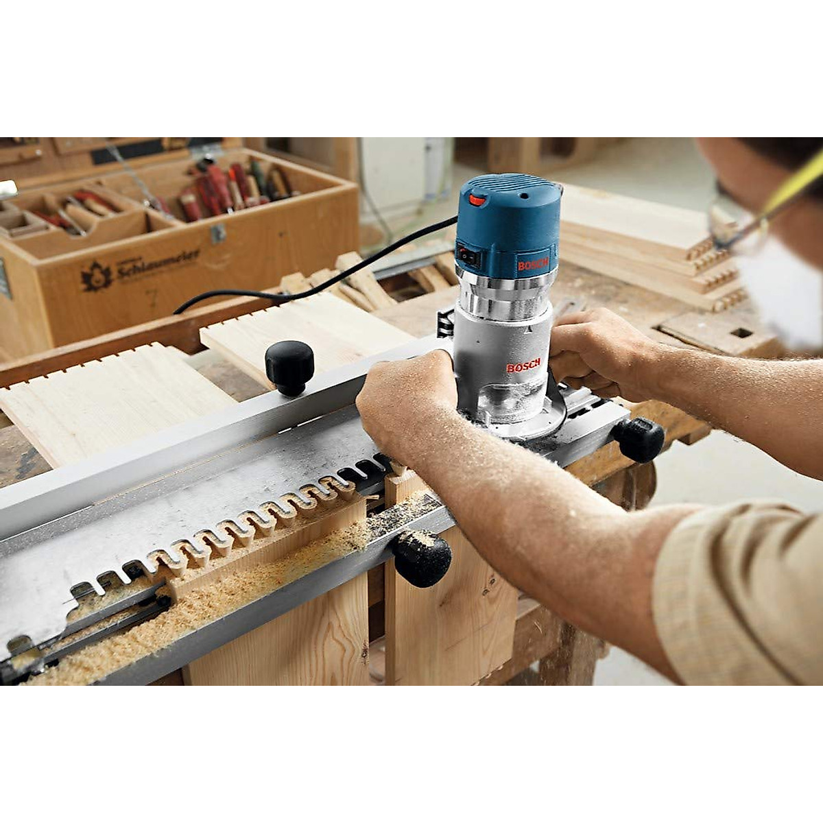 BOSCH 1617EVS 2.25 HP Electronic Fixed-Base Router and RA1171 25-1/2 in. x 15-7/8 in. Benchtop Laminated MDF Top Cabinet Style Router Table Bundle