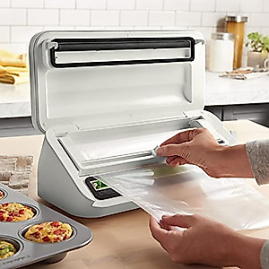FoodSaver Vacuum Sealer Machine with Sealer Bags and Roll, Bag Storage, Cutter Bar, and Handheld Vacuum Sealer for Airtight Food Storage and Sous Vide, White/Silver