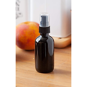 JUVITUS 2 oz Black Glass Luxury Boston Round Bottle with Black Treatment Pump (12 Pack) + Funnel