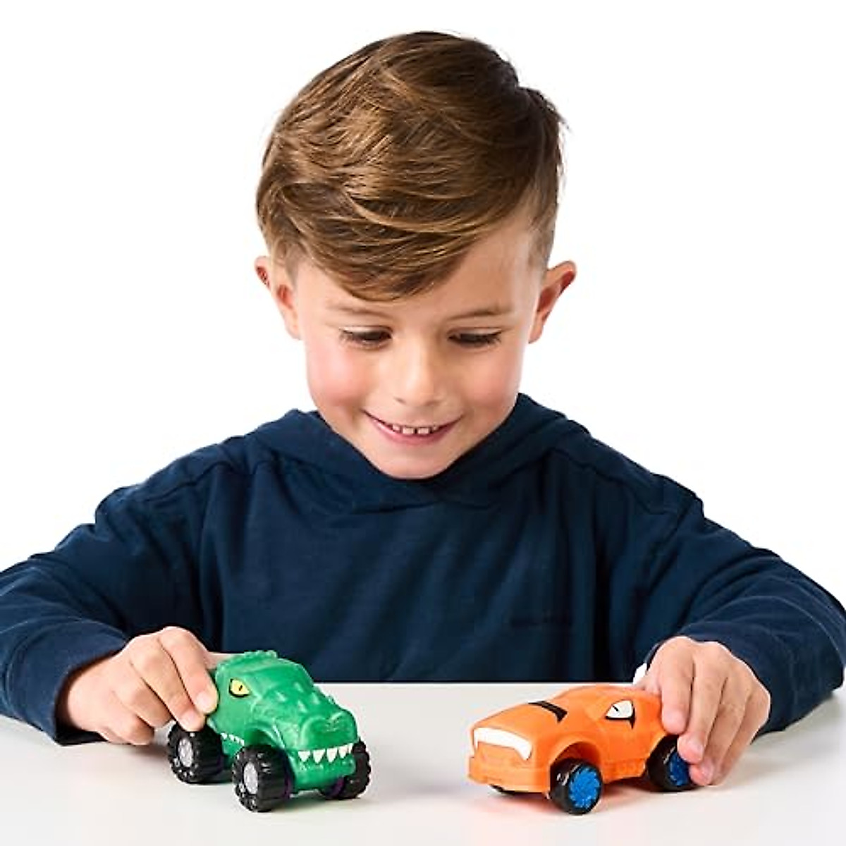 Heroes of Goo Jit Zu Goo Mobiles Versus Pack Turbo Tygor VS Rumble Rock Jaw. Two Stretchy, Squishy Vehicles. Stretch 'Em, Smash 'Em, Twist 'Em!