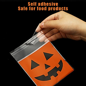 JarThenaAMCS 320Pcs Halloween Self Adhesive Treat Bags Funny Pumpkin Cellophane Bags Orange Black Candy Bags Plastic Goodie Bags for Party Gift Snack Wrapping Supplies