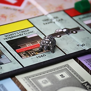 Monopoly Schitt's Creek | Game Tokens Include Bebe Crow, Patrick's Guitar, Rosebud Motel Key & More | Officially Licensed and Collectible Monopoly Game Based on Award Winning Series Schitt's Creek