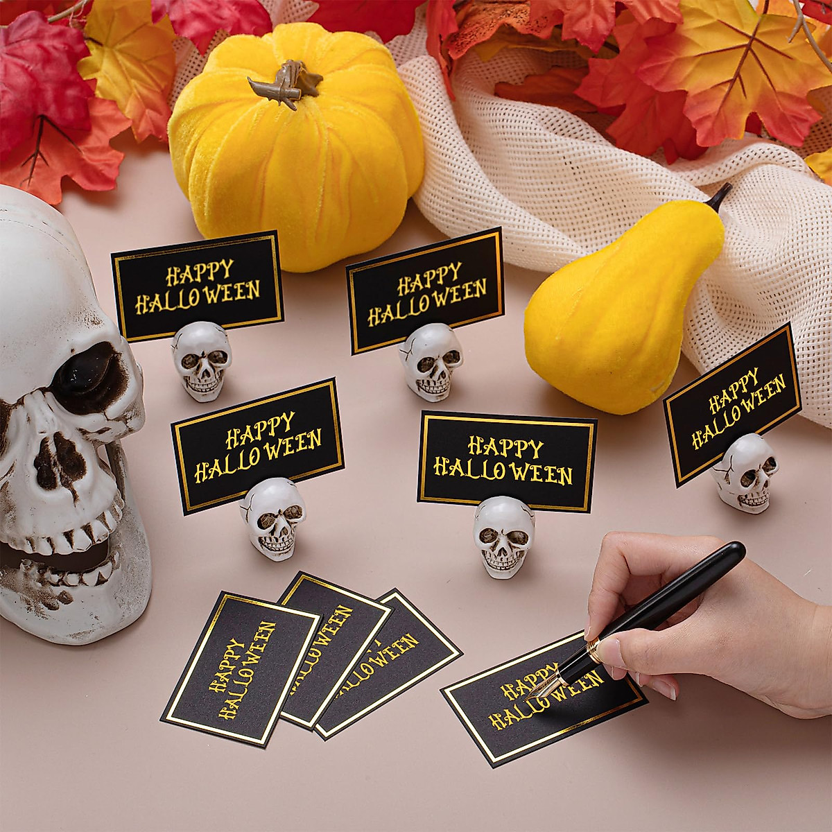 MotiMind 12 Pcs Halloween Skull Place Card Holders with 24 Pcs Place Cards Resin Small Skull Head Table Number Holders Clips Photo Stand Centerpieces for Halloween Party Wedding Birthday Decorations