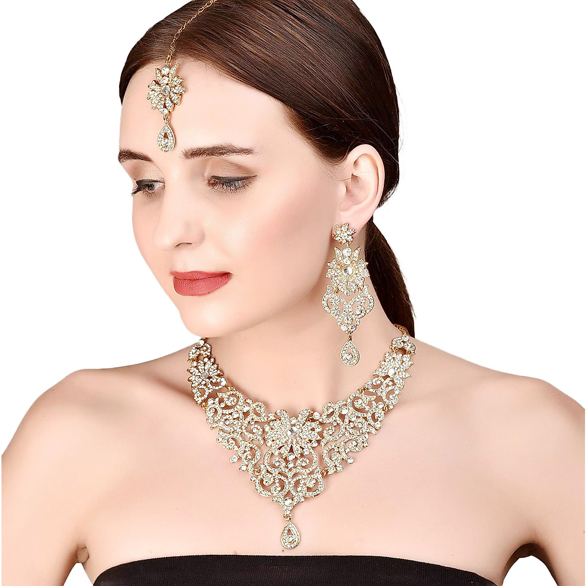 Touchstone Indian jewelry sets for women bollywood gold wedding bridal necklace desi earrings formal fancy rhinestone india designer jewellery punjabi white kundan tikka set in antique gold tone.