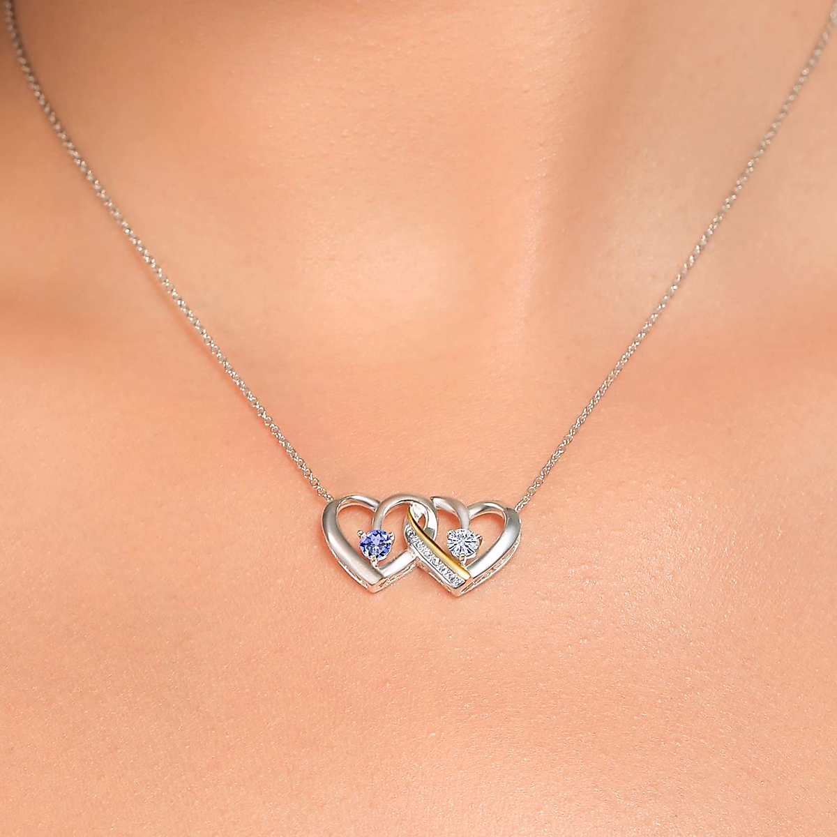 Gem Stone King 925 Silver and 10K Yellow Gold Blue Tanzanite Moissanite and Lab Grown Diamond Interlocking Heart Pendant Necklace For Women (0.56 Cttw, with 18 Inch Chain)