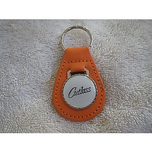 1960's 1970's ERA CUTLASS EMBLEM LOGO LEATHER KEYCHAIN - PUMPKIN