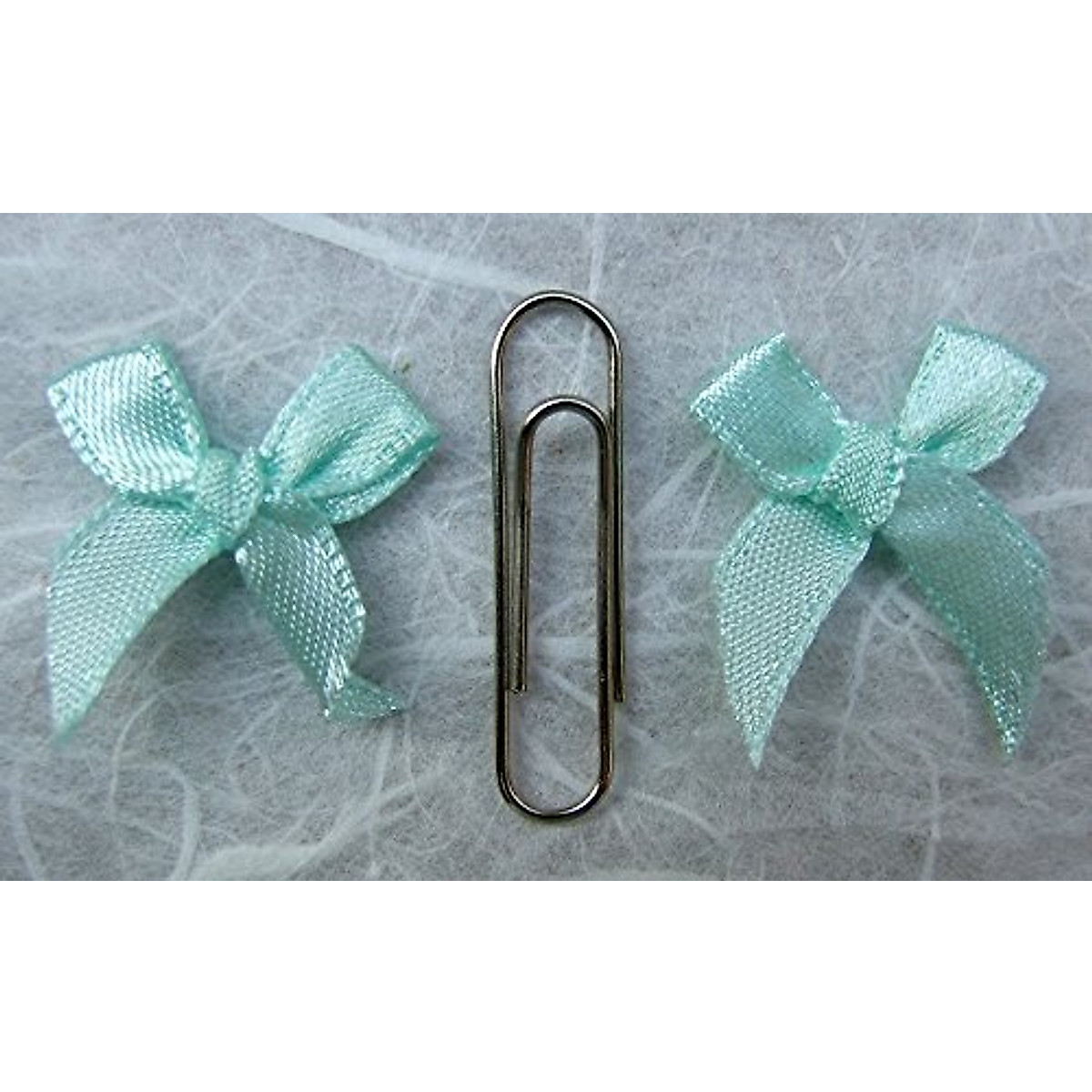 ICRAFY 100 Tiny Satin Ribbon Bows Blue Sea Color Mini Embellishment Craft Artificial Applique Wedding Ribbon Width 7 mm.