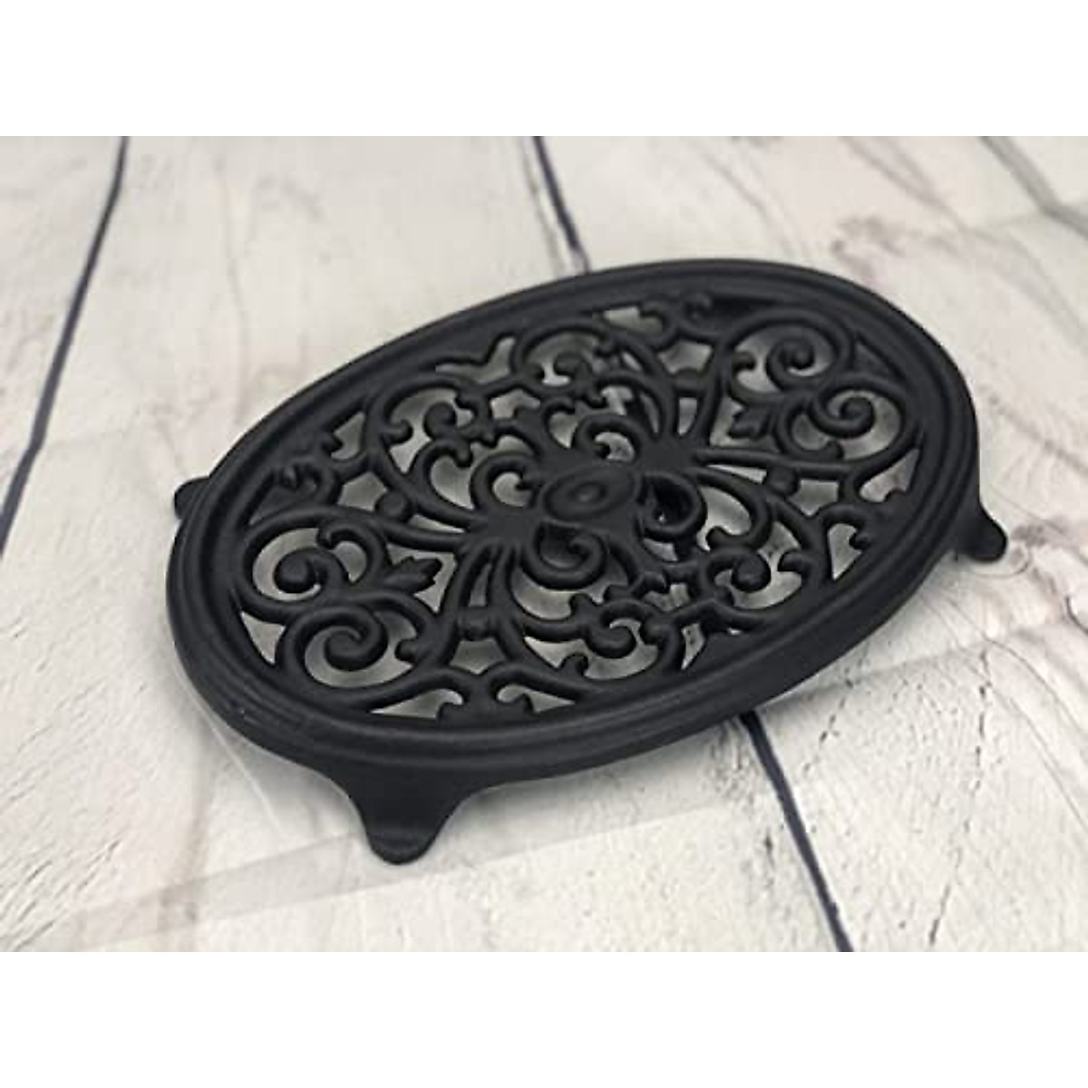 Matte Black Oval Filigree Steamer Trivet
