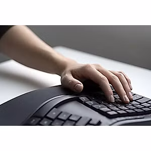 Microsoft Ergonomic Keyboard - Black. Wired, Comfortable, Ergonomic Keyboard with Cushioned Wrist and Palm Support. Split Keyboard. Dedicated Office Key.