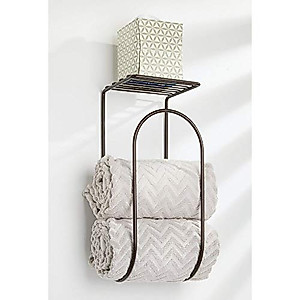 mDesign Modern Metal Wire Wall Mount Towel Rack Holder and Organizer with Storage Shelf - for Bathroom Towels, Washcloths, Hand Towels - Decorative Curved Design - Bronze