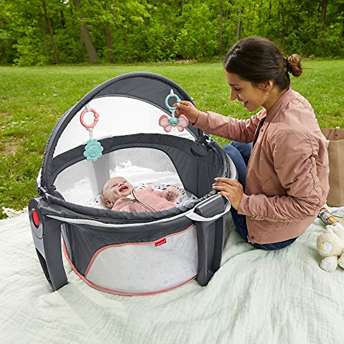 Fisher-Price Portable Bassinet and Play Space On-The-Go Baby Dome with Developmental Toys and Canopy, Pink Pacific Pebble
