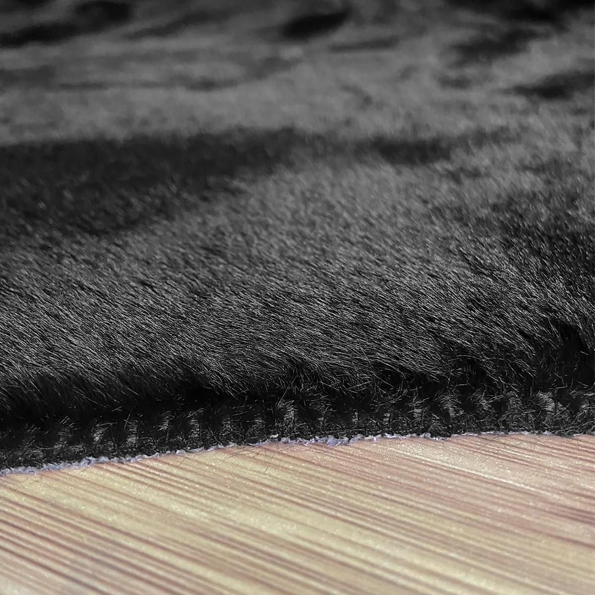 Faux Fur Cowhide Rugs (5 * 7 ft), Machine Washable Cow Print Area Carpet Black Color with Non-Slip Suede Backing, Durable & No Shedding