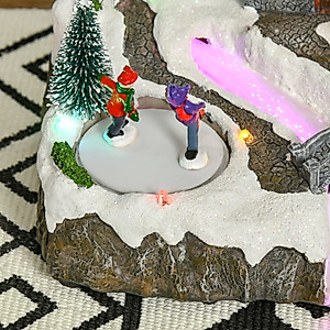 HOMCOM Christmas Village, Rotating Skating Pond Animated Winter Wonderland Set with Multicolored LED Light, Music, Fiber Optic, Battery-Operated Christmas Decoration