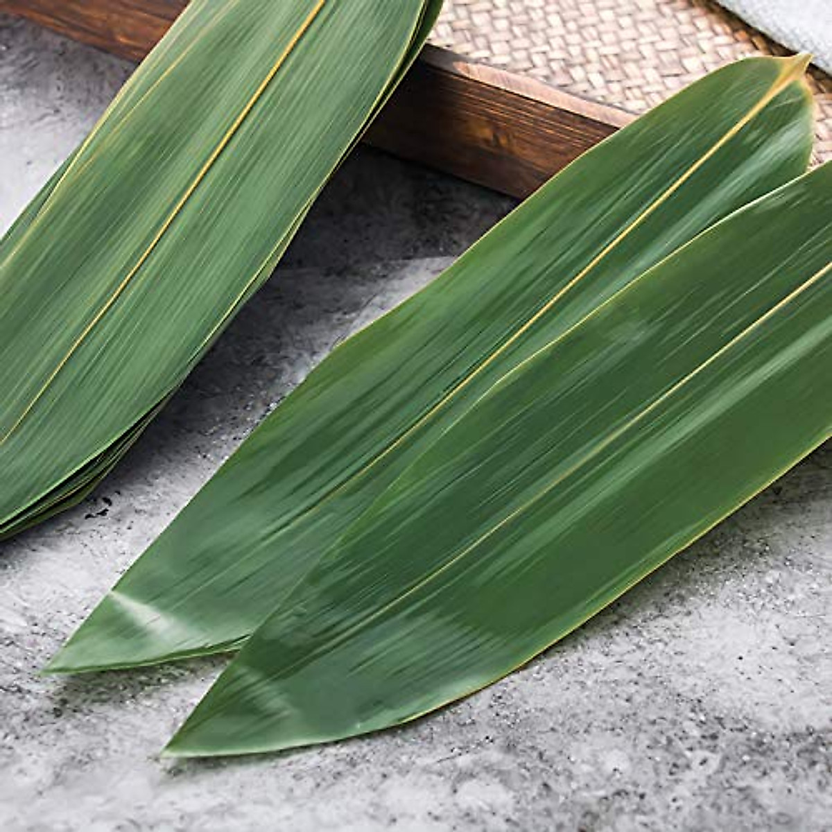 100 pcs Sushi Bamboo Leaf - Banana Leaves Make Zongzi Kit Plate Decorations Holiday Party for cooking (100 pcs, 12" L x 3.2" W) - Leaves Remains Vaccuum and Fresh