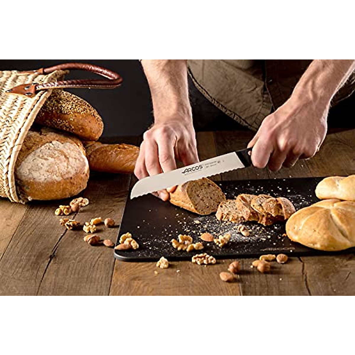 ARCOS Bread Knife 8 Inch Stainless Steel. Kitchen Serrated Knife with Ergonomic Polyoxymethylene Handle and 240mm Blade. Series Universal. Color Black