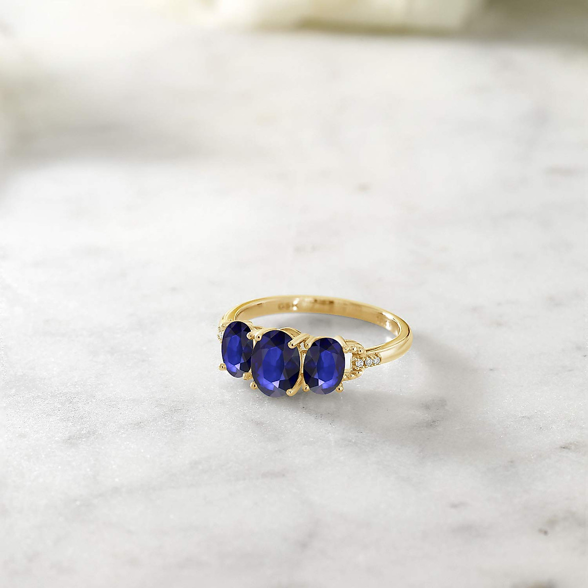 Gem Stone King 10K Yellow Gold Oval Blue Sapphire and Diamond Women Engagement Ring (4.23 Cttw, Available In Size 5, 6, 7, 8, 9)