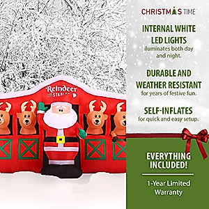 Christmas Time 4-Ft. Inflatable Santa Claus in a Reindeer Stable with LED Lights | Festive Holiday Blow-Up Decorations |Blower, Stakes, Ropes, and Storage Bag Included | CT-RDRSTBLE041-L, Red