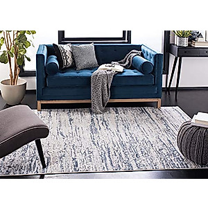 SAFAVIEH Amelia Collection Area Rug - 8' x 10', Ivory & Blue, Modern Abstract Design, Non-Shedding & Easy Care, Ideal for High Traffic Areas in Living Room, Bedroom (ALA768A)