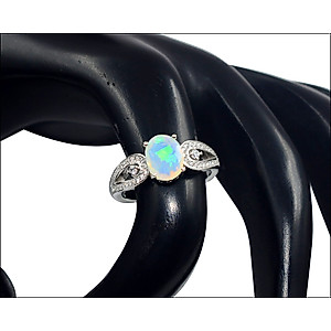 925 Sterling Silver Natural Ethiopian Welo Cut Opal 9X7 MM Oval October Birthstone Solitaire Unisex Proposal Ring For Engagement Gift (Rhodium Plated Silver, 7.5)