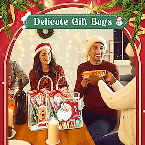 Henoyso 24 Pcs Christmas Clear Gift Bags Plastic Candy Treat Bags Snowman Santa Gift Bags with Handles and Ribbon PVC Gift Wrap Totes for Xmas Party Favors(7.8 x 7.8 x 3.1)