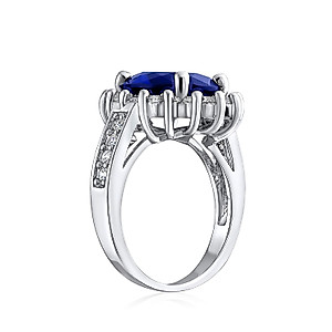 Bling Jewelry Personalize Classic Traditional 5CTW Royal Blue CZ Crown Halo Oval Cubic Zirconia Simulated Sapphire Engagement for Women Side Stones Promise Ring Silver Plated Customizable