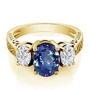 Gem Stone King 18K Yellow Gold Plated Silver 3-Stone Ring Oval Millennium Blue Mystic Quartz and Moissanite (2.80 Cttw) (Size 6)