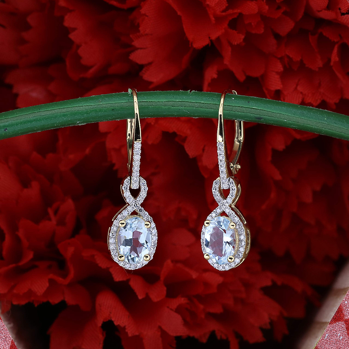 Dazzlingrock Collection 10K Oval Aquamarine & Round White Diamond Ladies Infinity Dangling Earrings, Yellow Gold