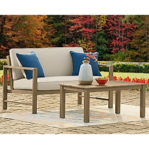 Signature Design by Ashley Outdoor Fynnegan Patio Eucalyptus Loveseat & Coffee Table, Beige with Blue Pillows