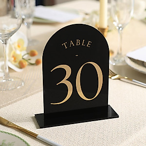 UNIQOOO Black Arch Wedding Table Numbers with Stands 1-30, Gold Foil Printed 5x7 Double Sided Acrylic Signs and Holders, Perfect for Centerpiece, Reception, Decoration, Party, Anniversary, Event