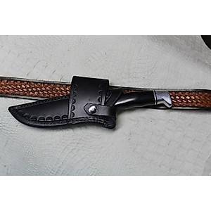 Buck 119 Cross Draw Knife Sheath. This Sheath Is Made Out of 8 Ounce Leather the Leather Is Very Soft Durable and Pliable You Will Not Need to Line Your Sheath for Your Finer Knives. The Leather Is Dyed Black with Border Tooling. The Sheath Can Be Worn on