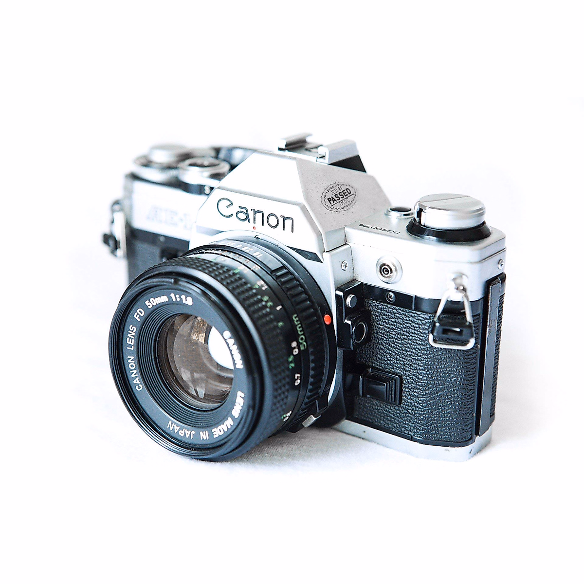 Vintage Canon AE-1 35mm SLR Camera with 50mm 1:1.8 Lens (Renewed)