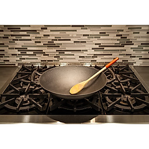 It's useful. 14 Inch Cast Iron Wok with Handles and Built in Base