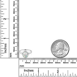 Gem Stone King 10K White Gold White Simulated Opal and Diamond Engagement Ring For Women (0.60 Cttw, Oval Cabochon 9X7MM) (Size 7)