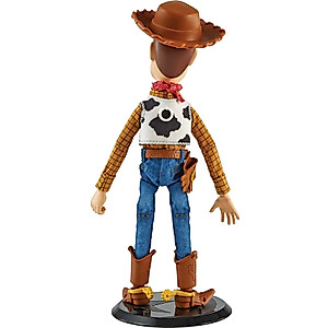 Mattel Pixar Spotlight Series Woody Figure, Disney Pixar Toy Story Collectable, 9.2-in Tall with 2 Hand Sets, 2 Expressions, Articulation & Display Box with Reversible Background