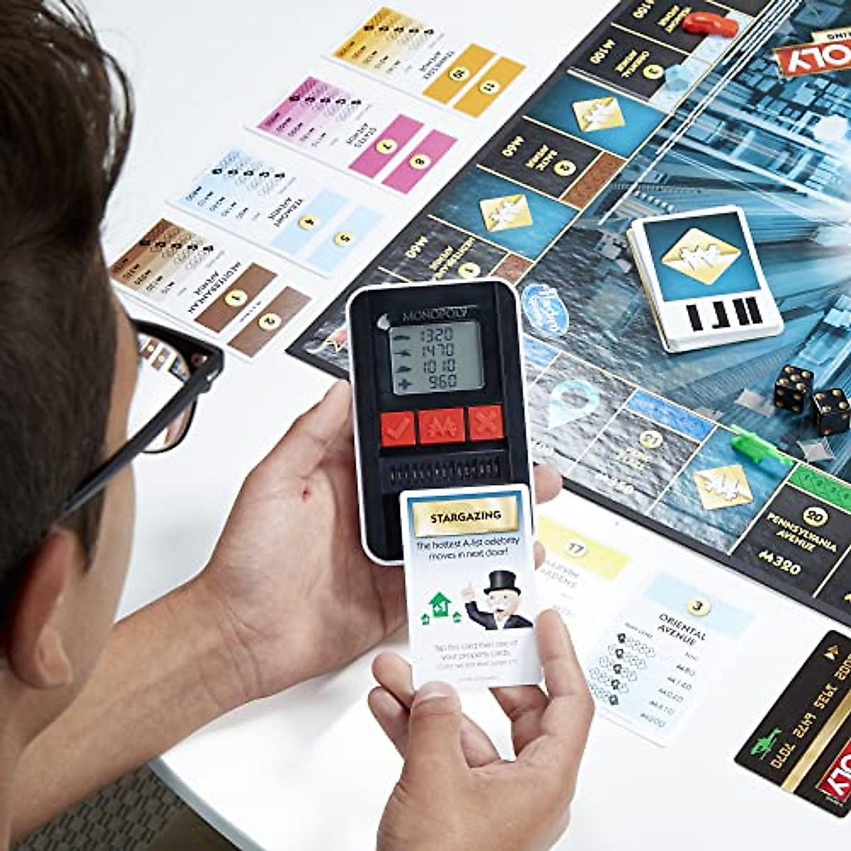 Hasbro Gaming Monopoly Ultimate Banking Edition Board Game for Families and Kids Ages 8 and Up, Electronic Banking Unit (Amazon Exclusive)