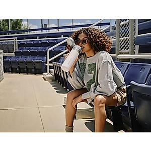 STANLEY Quick Flip GO Water Bottle 36 oz | Push Button Lid | Leakproof and Packable for Travel and Sports | Insulated Stainless Steel | BPA-Free | Rose Quartz