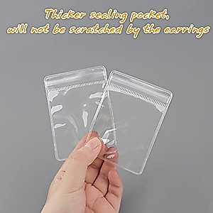 Designster Transparent Jewelry organizer book - Jewelry Storage Album for Earring Organizer Storage Book Bag, Jewelry Travel Organizer Holder for Necklace Rings Bracelet Studs (84 Slots+50 Thicken PVC Bags)