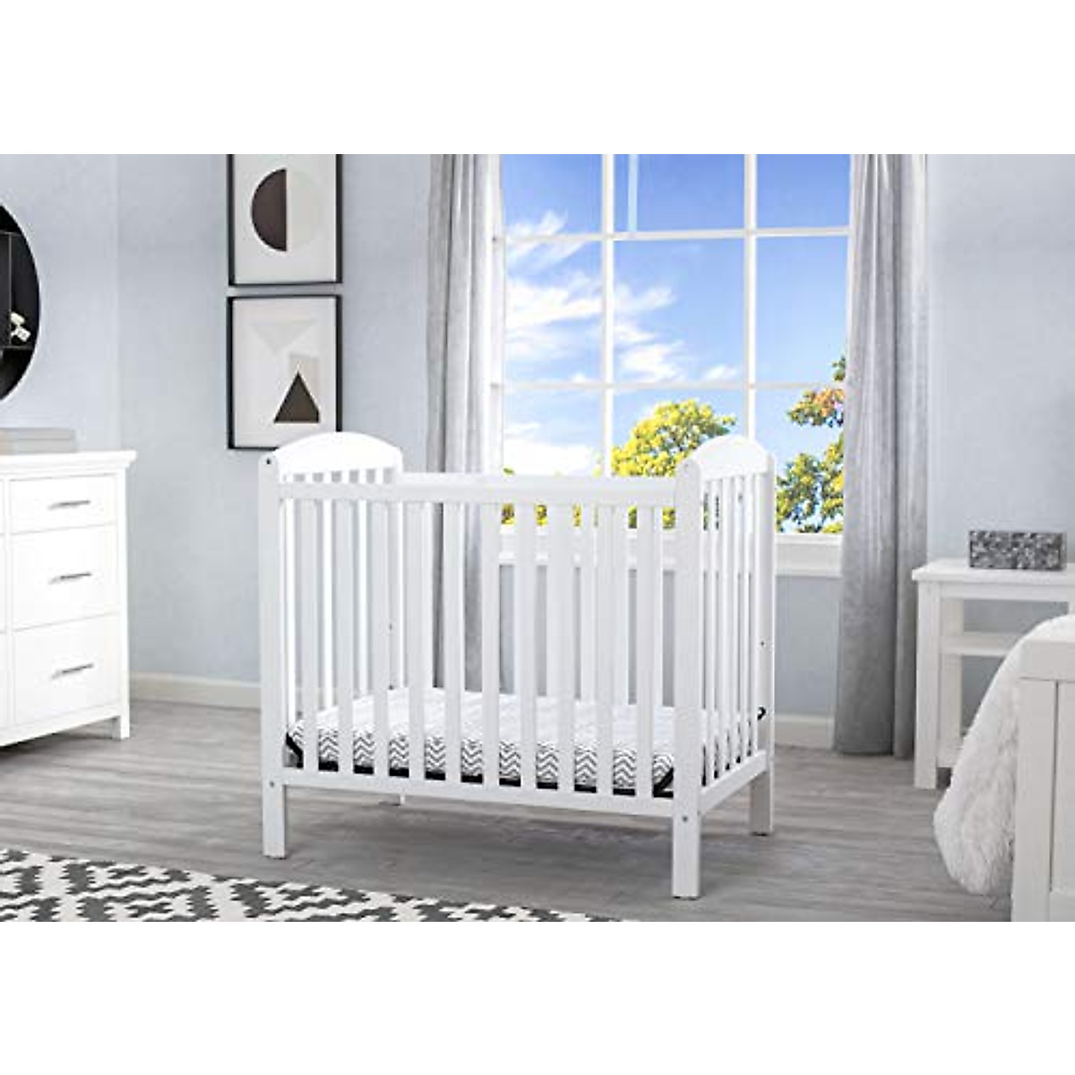 Delta Children Emery Mini Convertible Baby Crib with 2.75-inch Mattress, Bianca White