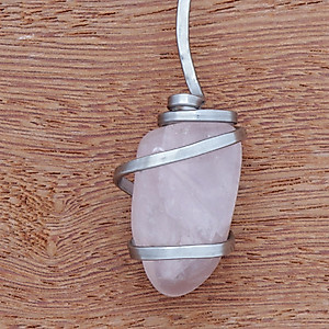NOVICA Artisan Handmade Rose Quartz Collar Necklace Pendant from Brazil Stainless Steel Modern Birthstone Gemstone [16.5 in L 2 in W Pendant(s) 1.6 in L x 1.2 in W x 0.6 in D] ' Love' S Magnitude'