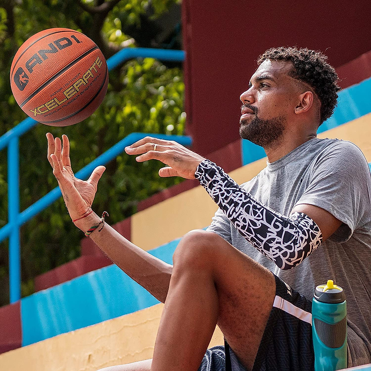 AND1 3-Pc Premium Rubber Basketball Bundle – Includes Official Regulation Size 7 (29.5”) Streetball (Deflated), Ball Pump and Squeeze Water Bottle Made for Indoor and Outdoor Basketball Games,Orange