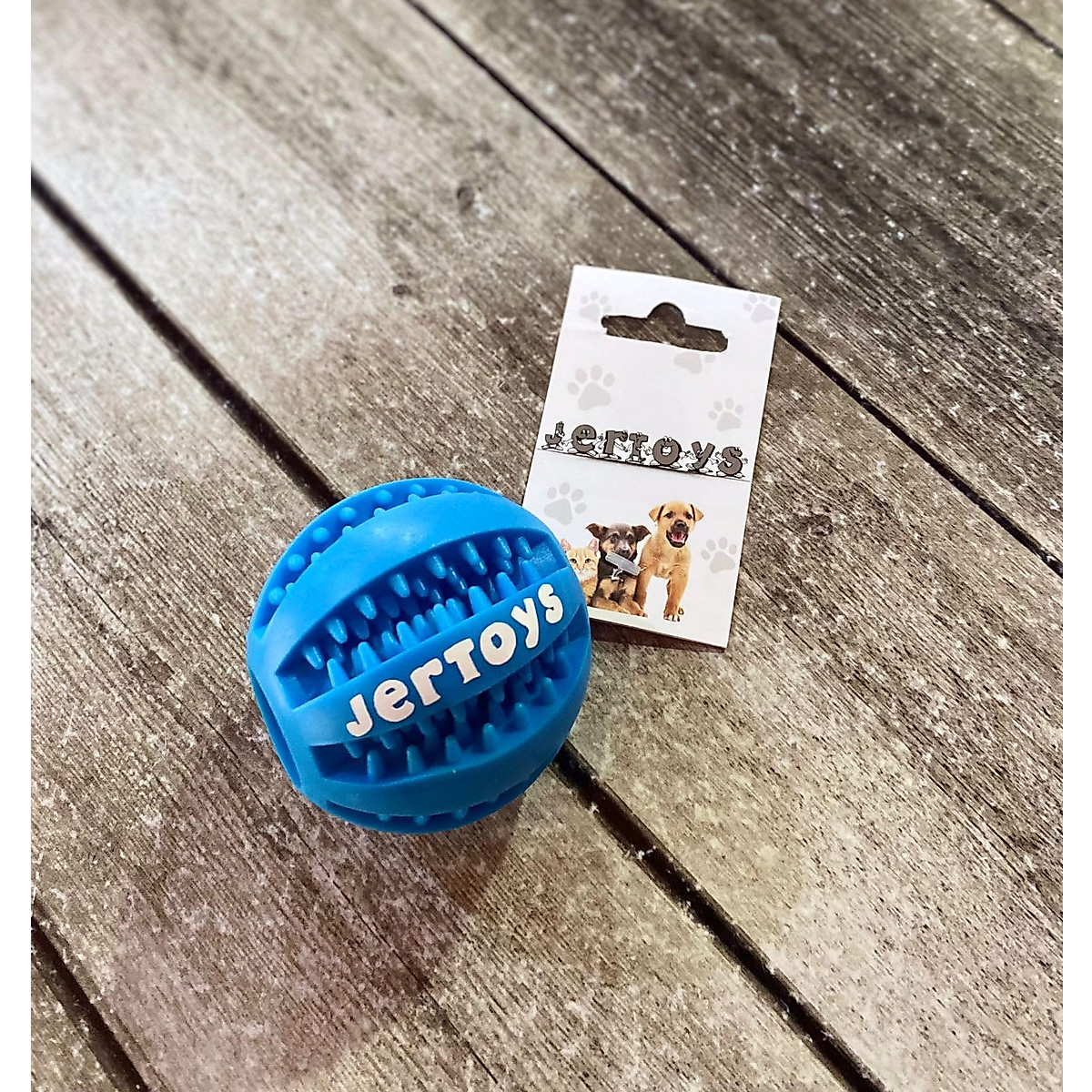 Jertoys Juguetes, Pelota para Perros Indestructible. Bola masticable resistente a las mordeduras con comedero en sus ranuras Ideal para la limpieza de dientes y entretemiento de sus mascotas (Blue)