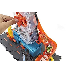 Hot Wheels Toy Car Track Set City Super Twist Tire Shop with 1:64 Scale Car, Single or Multi-Car Play