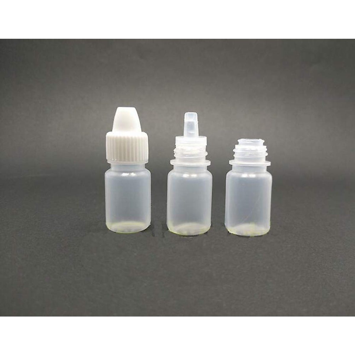 50 Pcs Empty Plastic Squeezable Dropper Bottle with Plug Refillable Portable Eye Liquid Container with Screw Cap (2 ml) by ASTRQLE