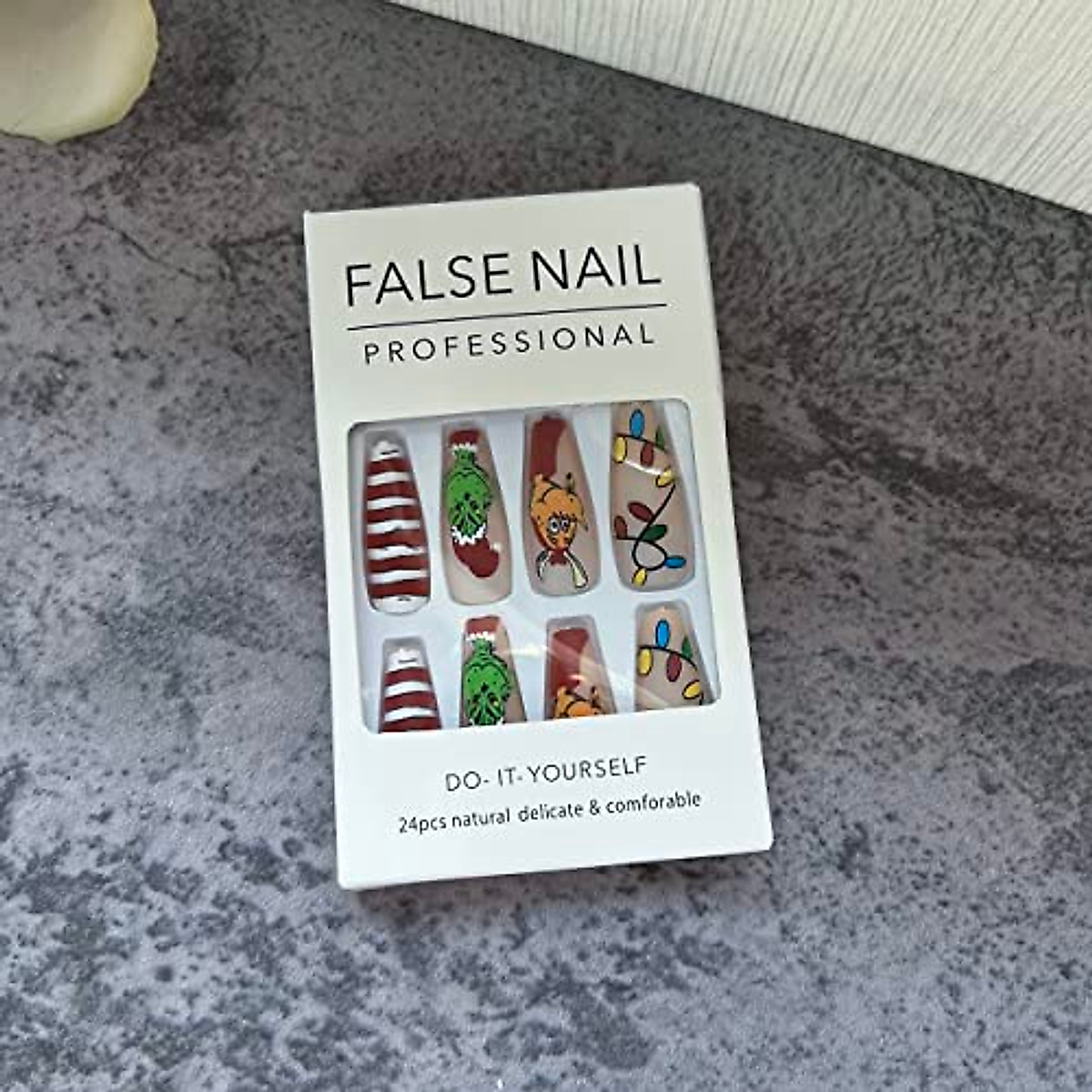 24Pcs Christmas Press on Nails Long Fake Nails Acrylic Ballet Nail Christmas Coffin Nail Full Cover Nail Grinch Design Artificial Cartoon Nails for Women and Girls